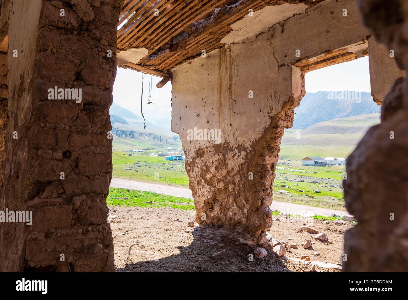 An old abandoned house. No people. The building is made of adobe and ...