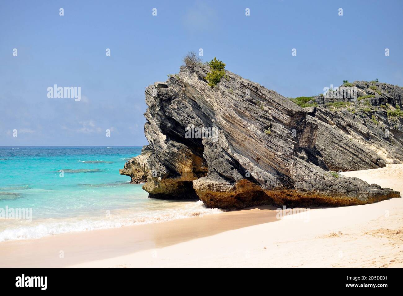 Volcanic rock at the Pink beach in Bermuda.Natural beauty of Horseshoe ...