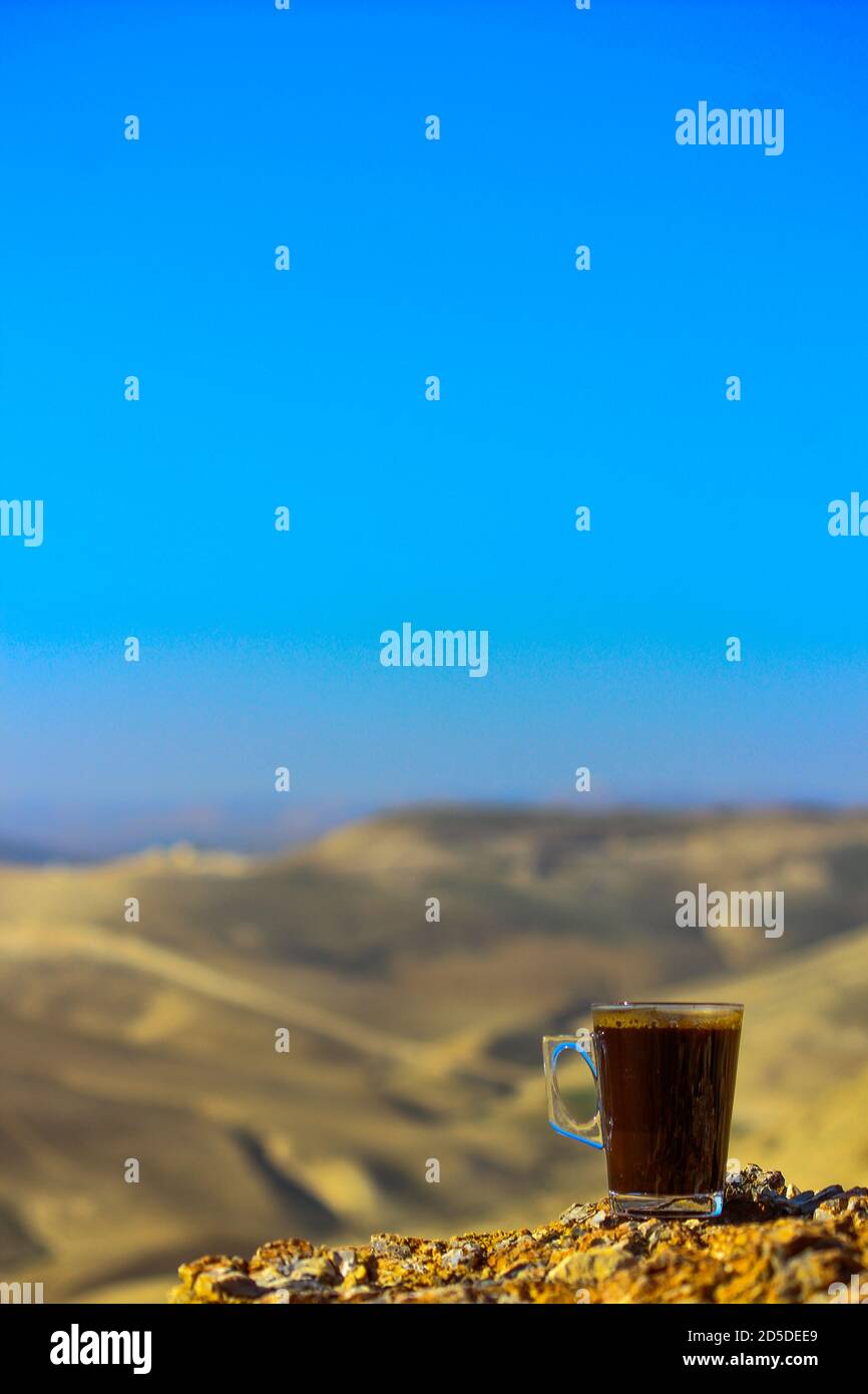 cup with coffee mountains landscape with sunlight. Beauty nature ...