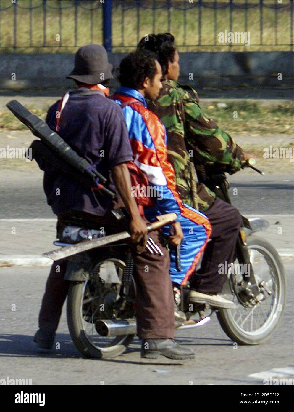 Brandishing guns hi-res stock photography and images - Alamy