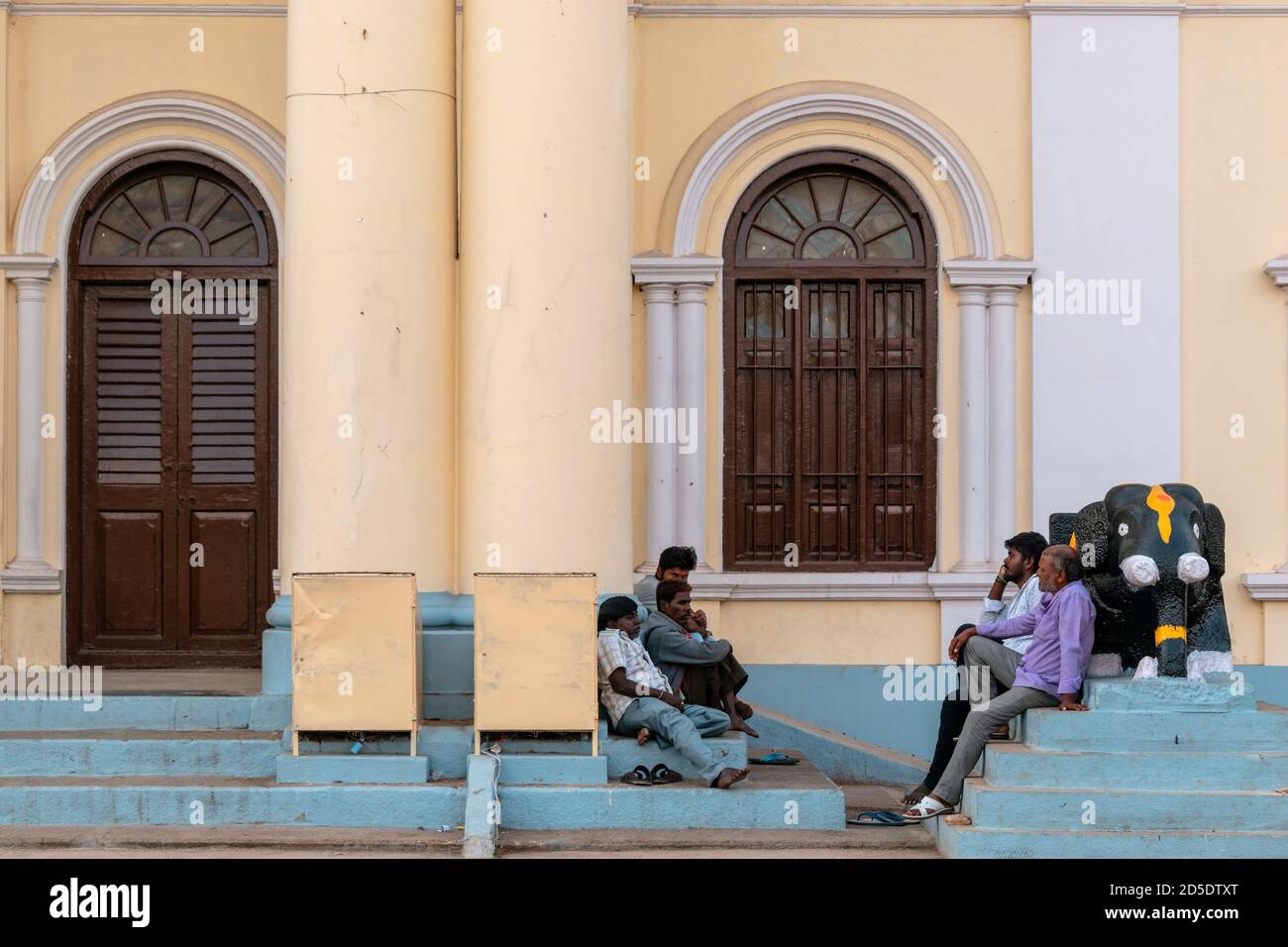 Mysore. Karnataka, India - August 2017: A group of men sitting on the ...