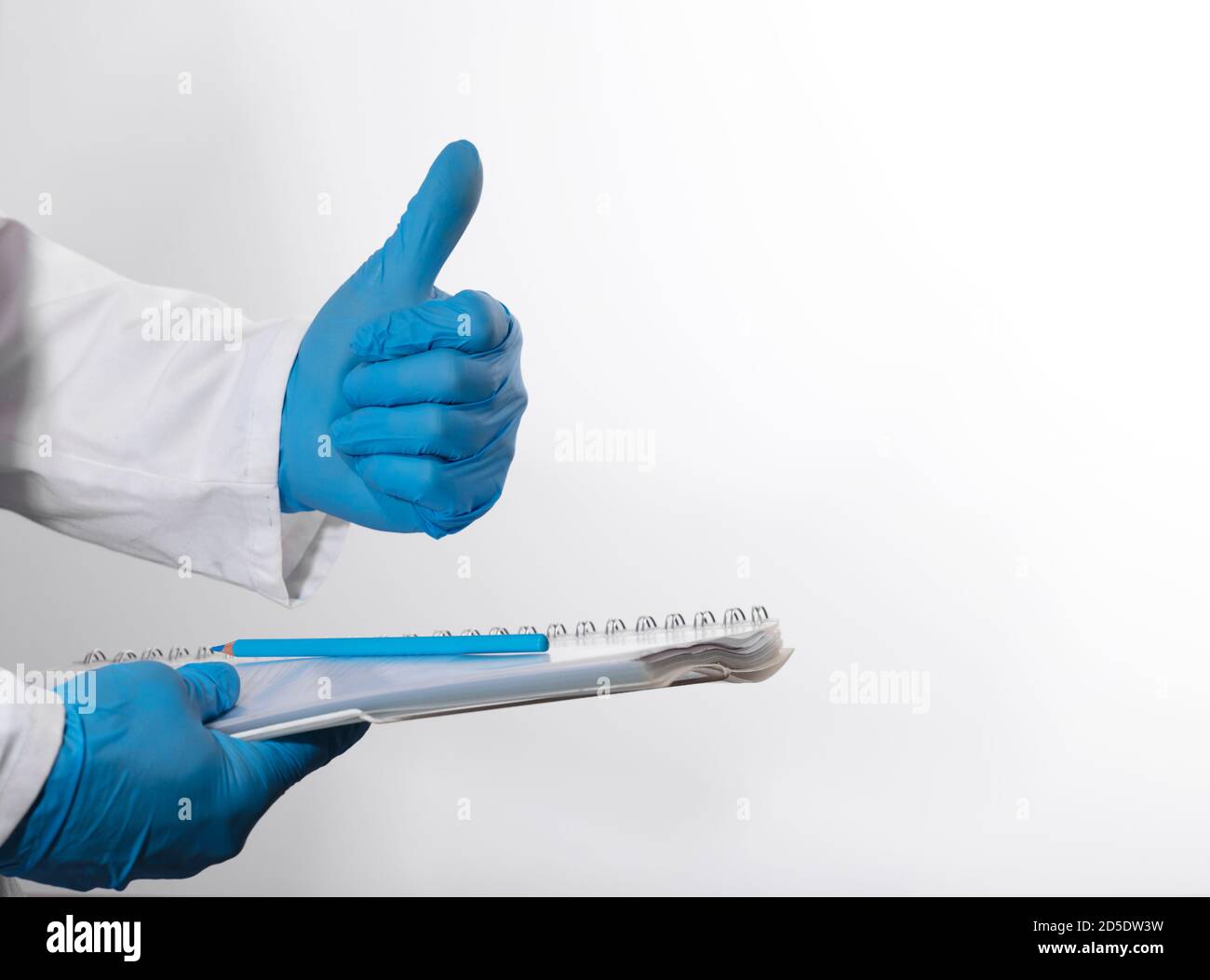 Woman doctor writes notes prescription hi-res stock photography and ...