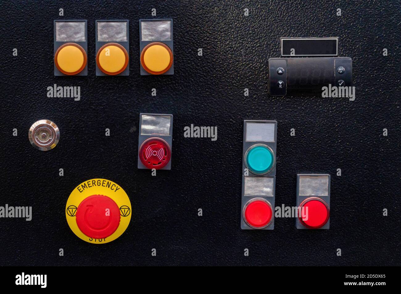 Industrial control panel at factory with yellow and red buttons Stock ...