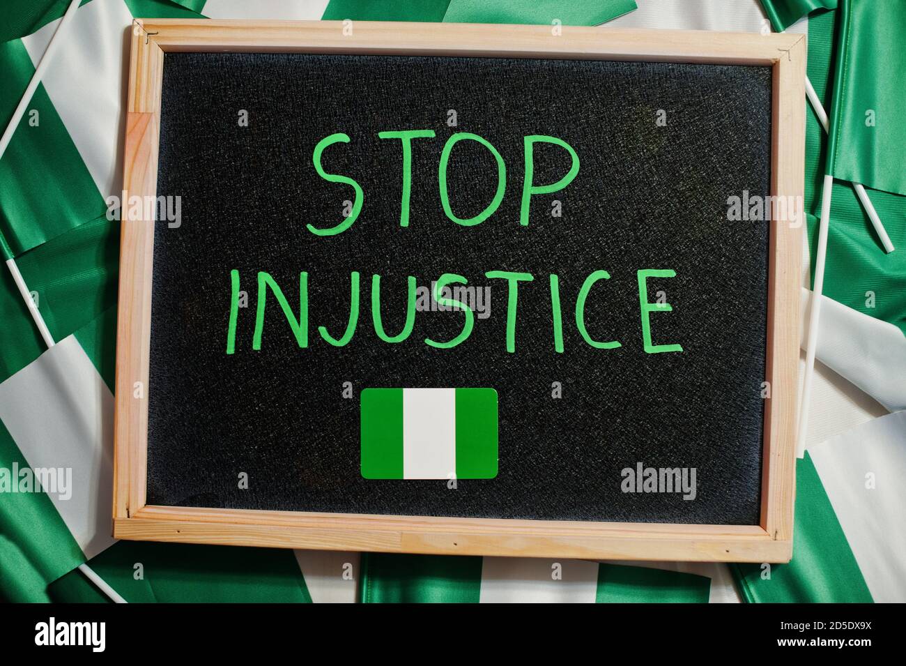 Stop injustice. Inscription of nigerian protest slogan Stock Photo - Alamy