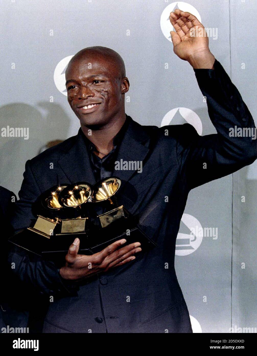 Holding grammy hi-res stock photography and images - Alamy