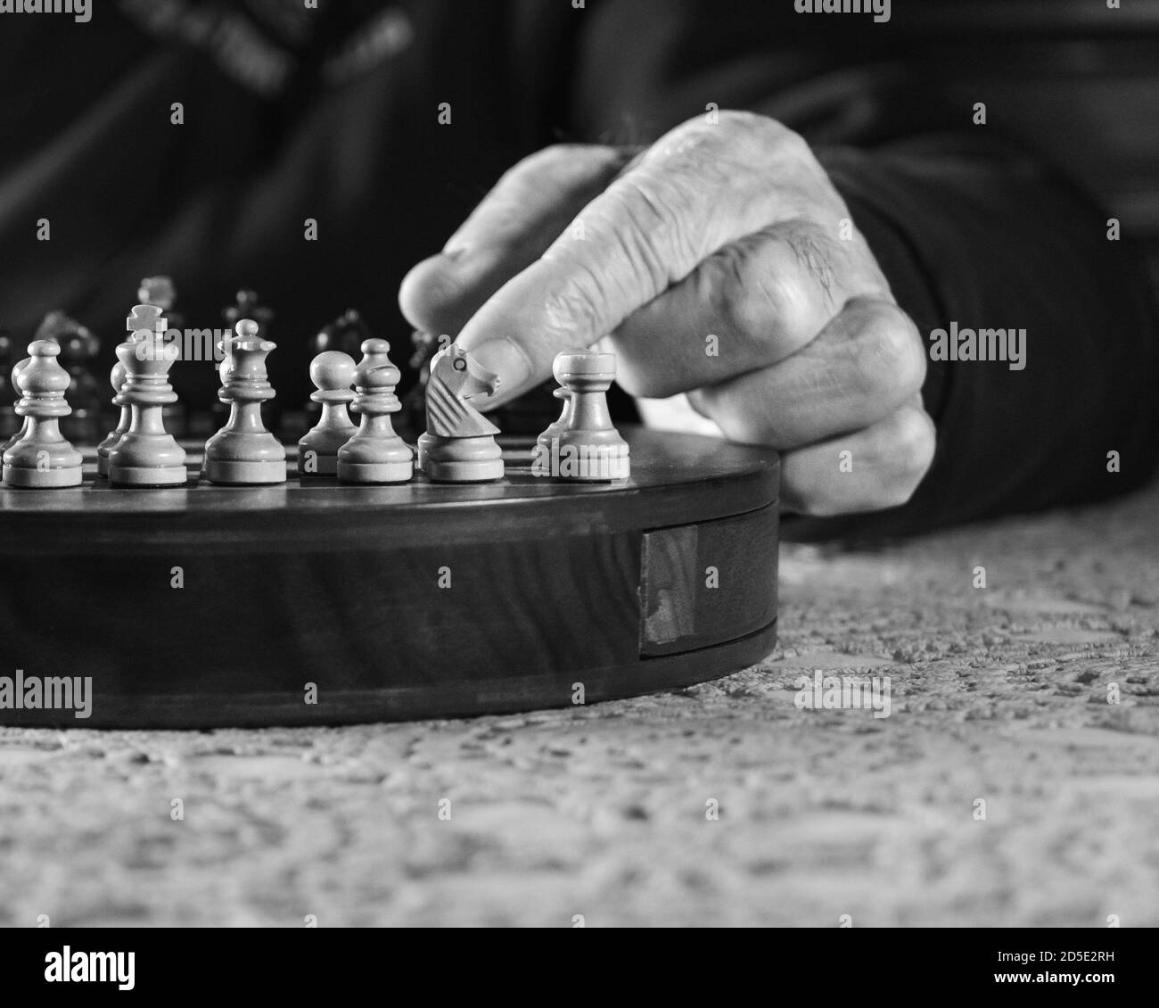Man holding chess piece people hi-res stock photography and images - Alamy