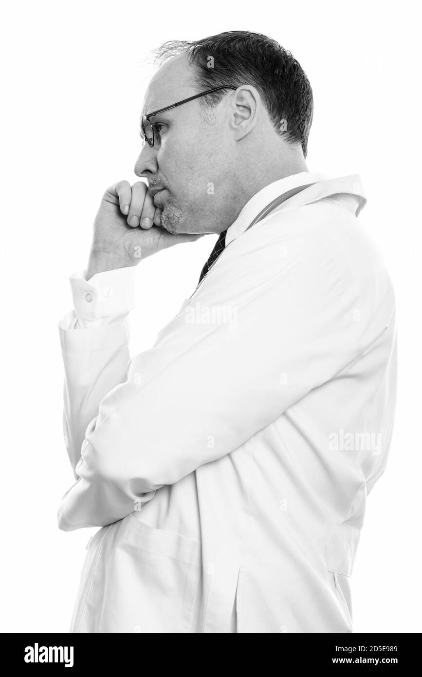 Pensive medical doctor thinking Black and White Stock Photos & Images ...
