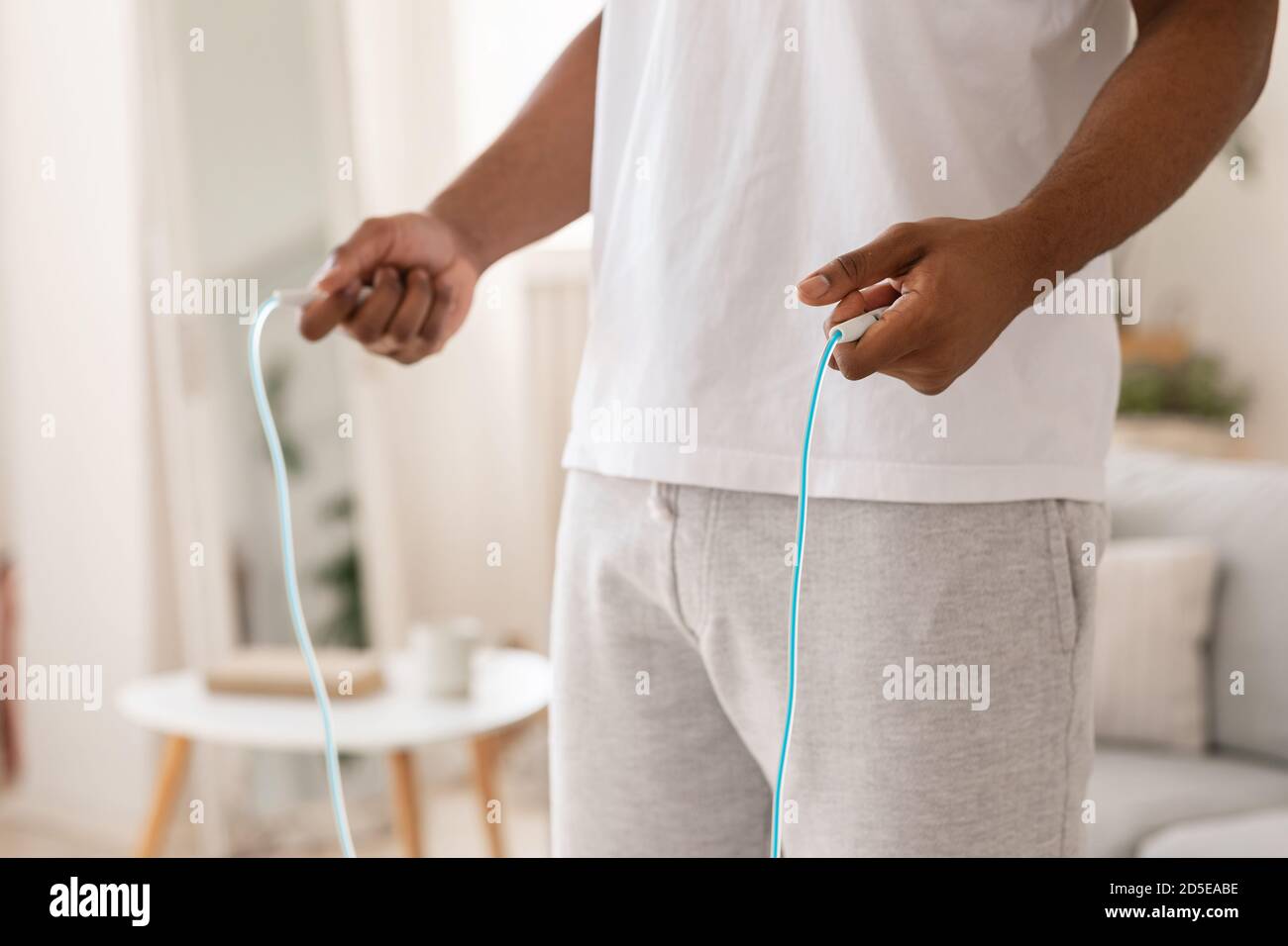 Man jumping rope black hi-res stock photography and images - Alamy