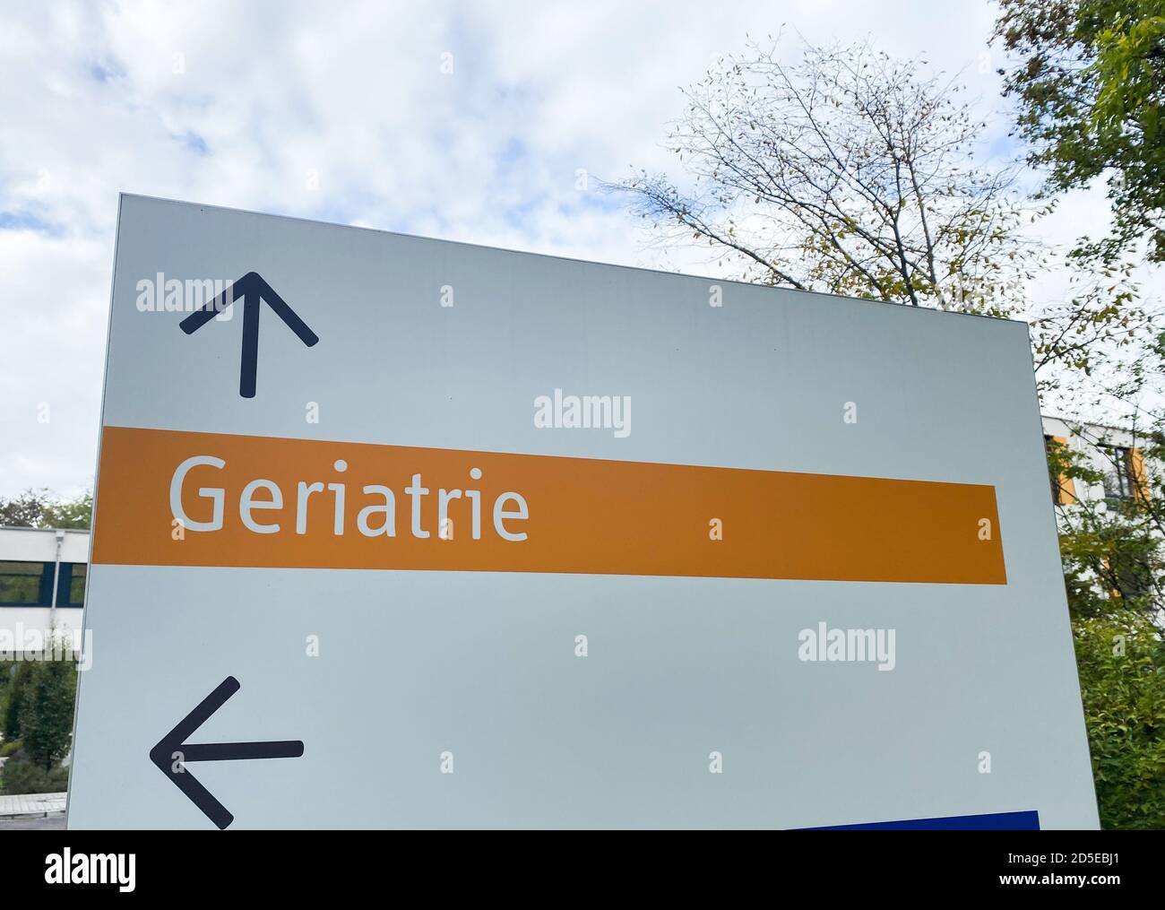 View on direction sign at german hospital with word geriatrie (english ...