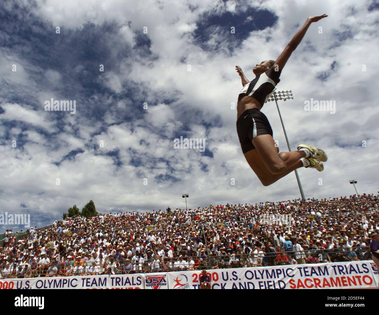 Winning long jump hi-res stock photography and images - Alamy