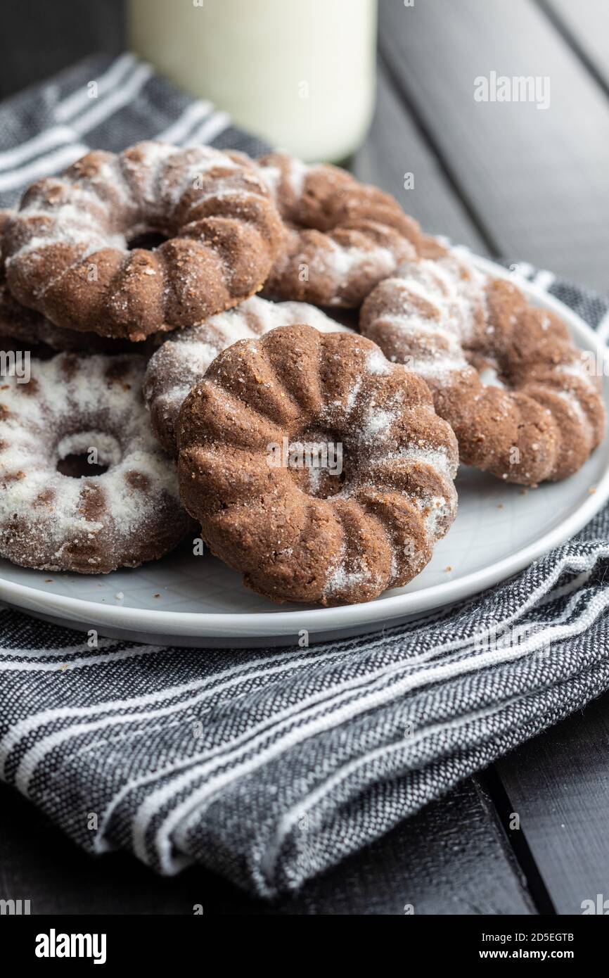 Sweet rings cookies. Biscuits with cocoa flavor on plate Stock Photo ...