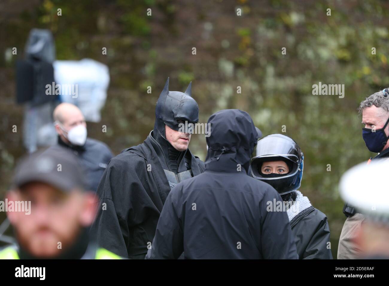 A man dressed as Batman during the filming of The Batman taking place ...