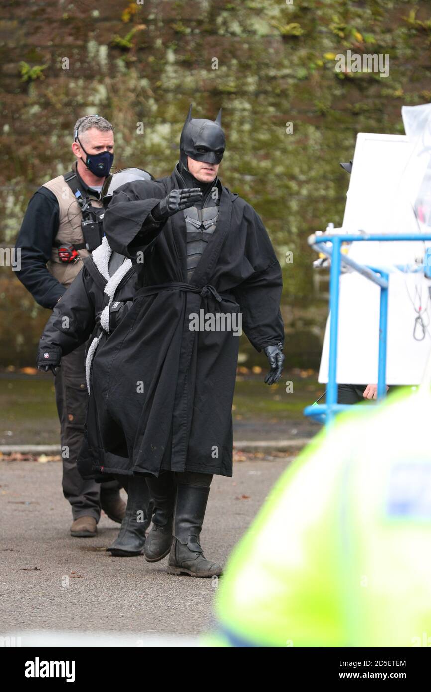 A man dressed as Batman during the filming of The Batman taking place ...