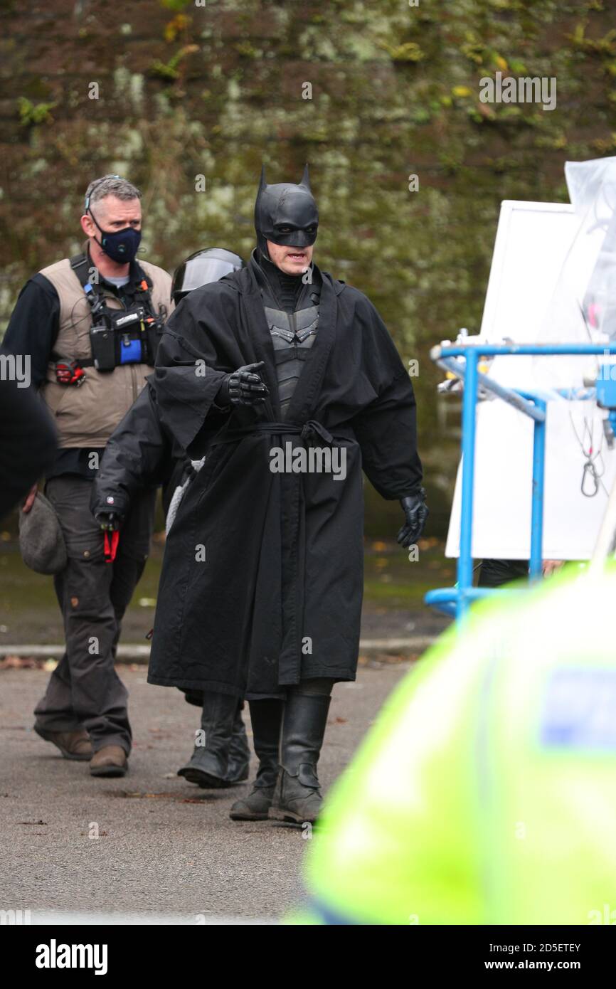 A man dressed as Batman during the filming of The Batman taking place ...