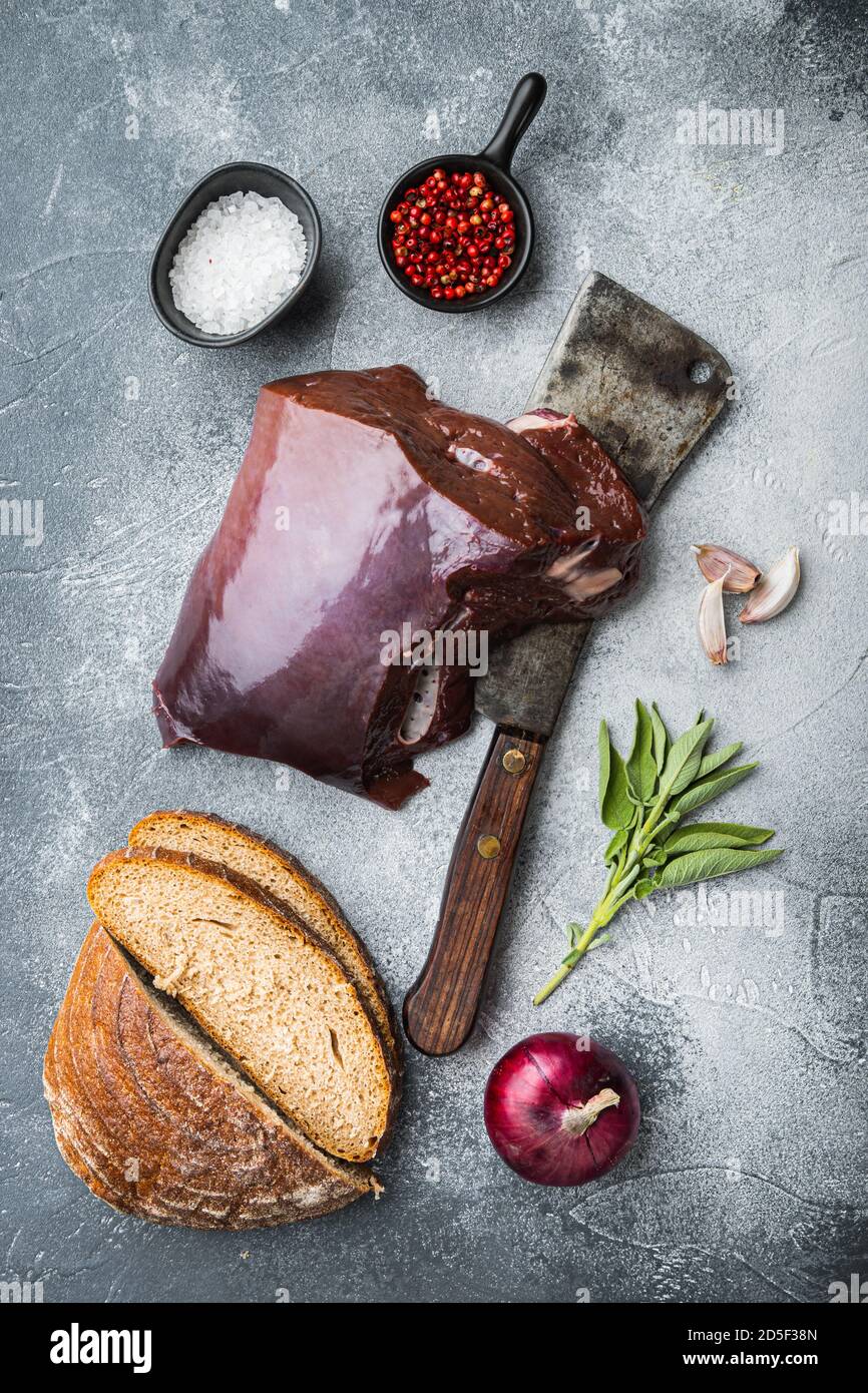 Raw liver on grey background, flat lay Stock Photo - Alamy