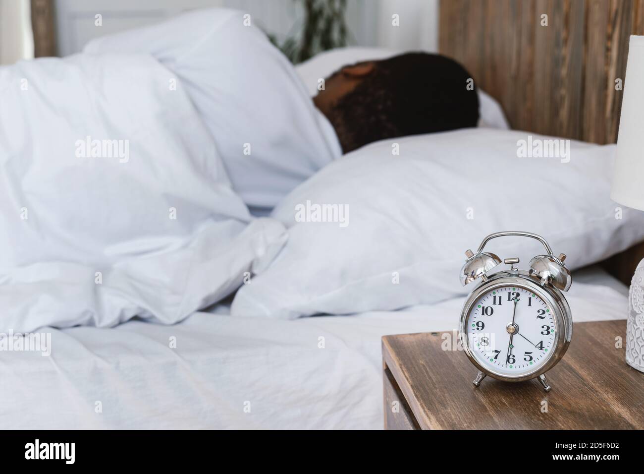 Overslept Black Man Sleeping Through Alarm-Clock Lying In Bed Indoor ... Overslept Black Man Sleeping Through Alarm-Clock Lying In Bed Indoor ...