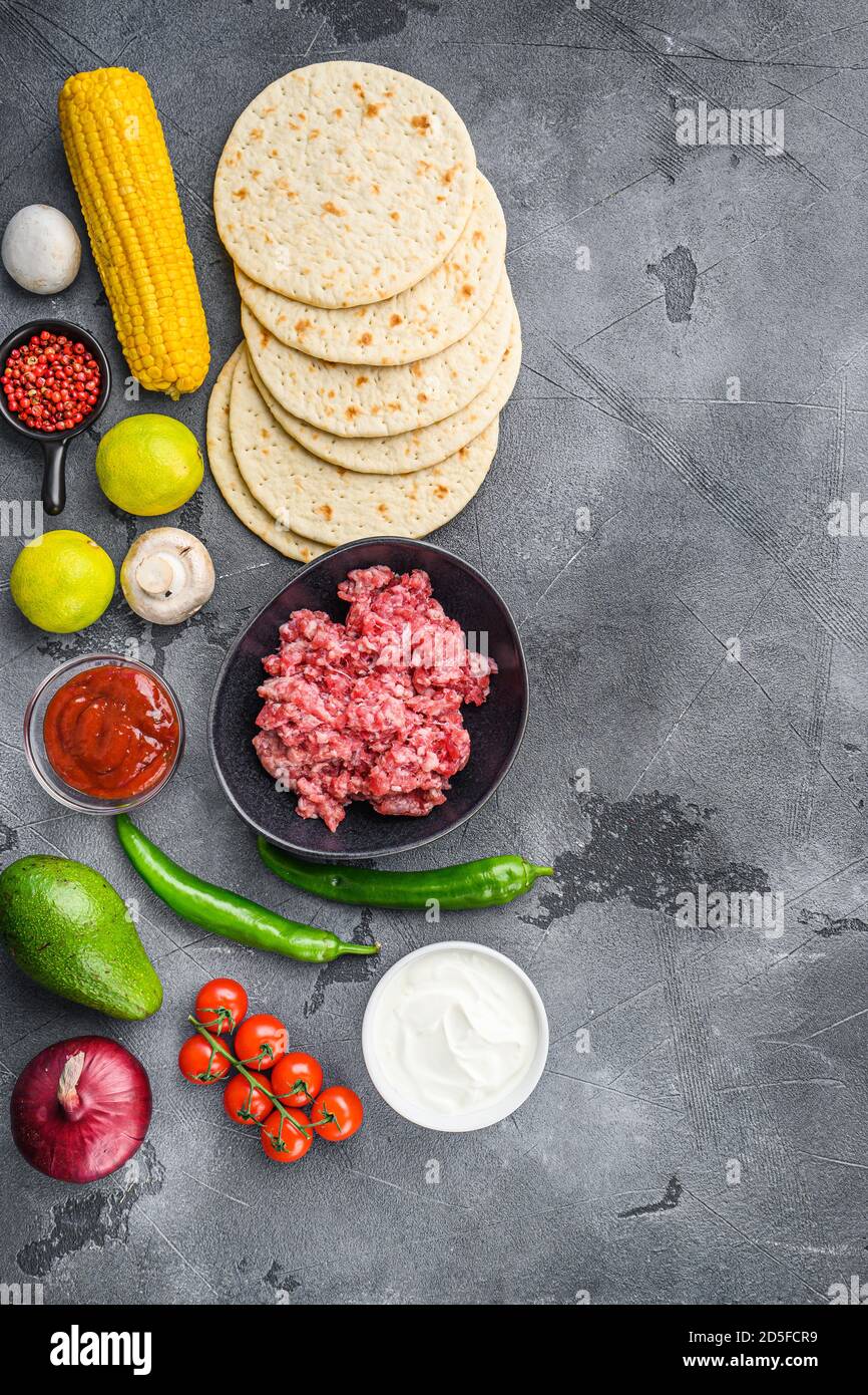 Traditional homemade taco ingredients with meat,salsa, peppers ...