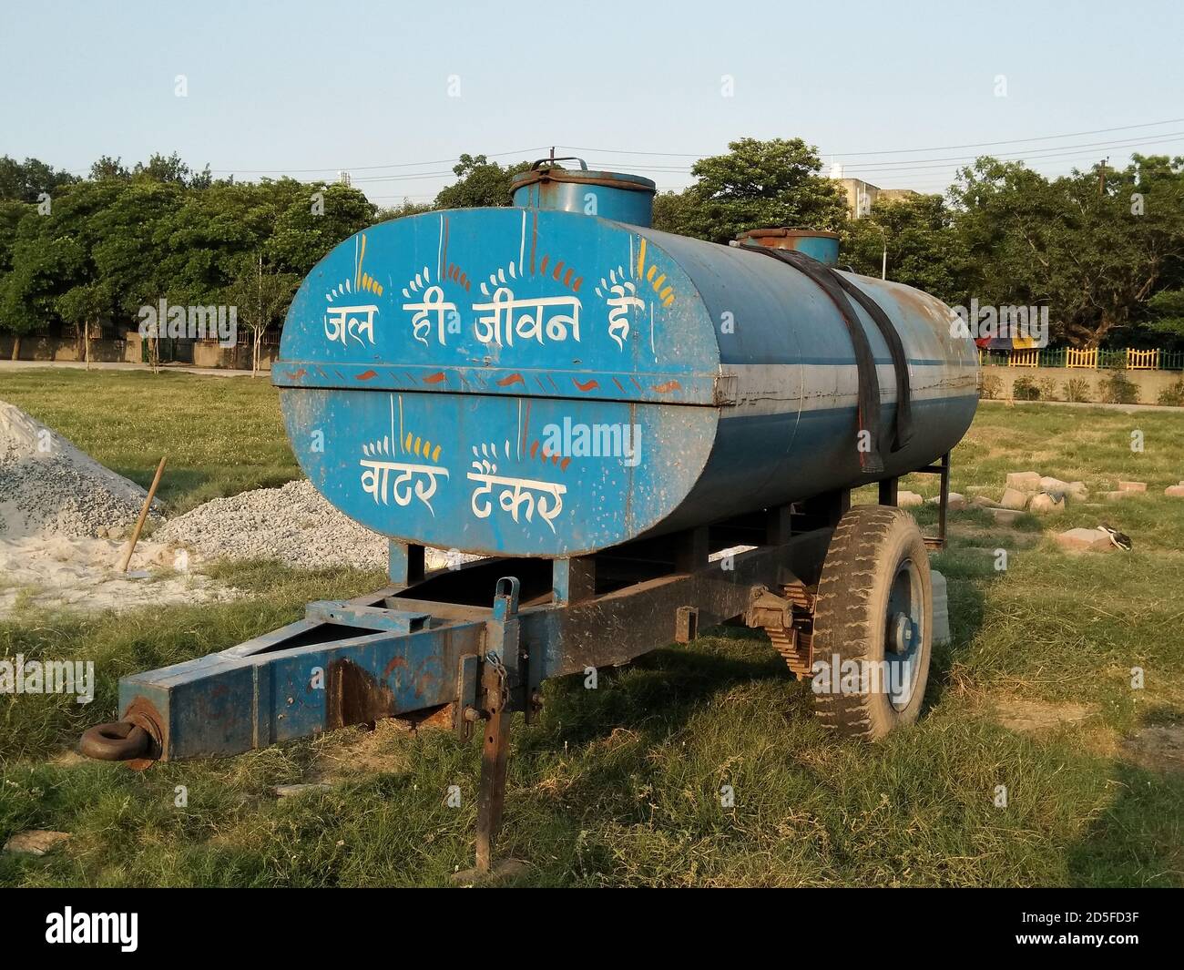 A picture of water tanker with blur background Stock Photo - Alamy