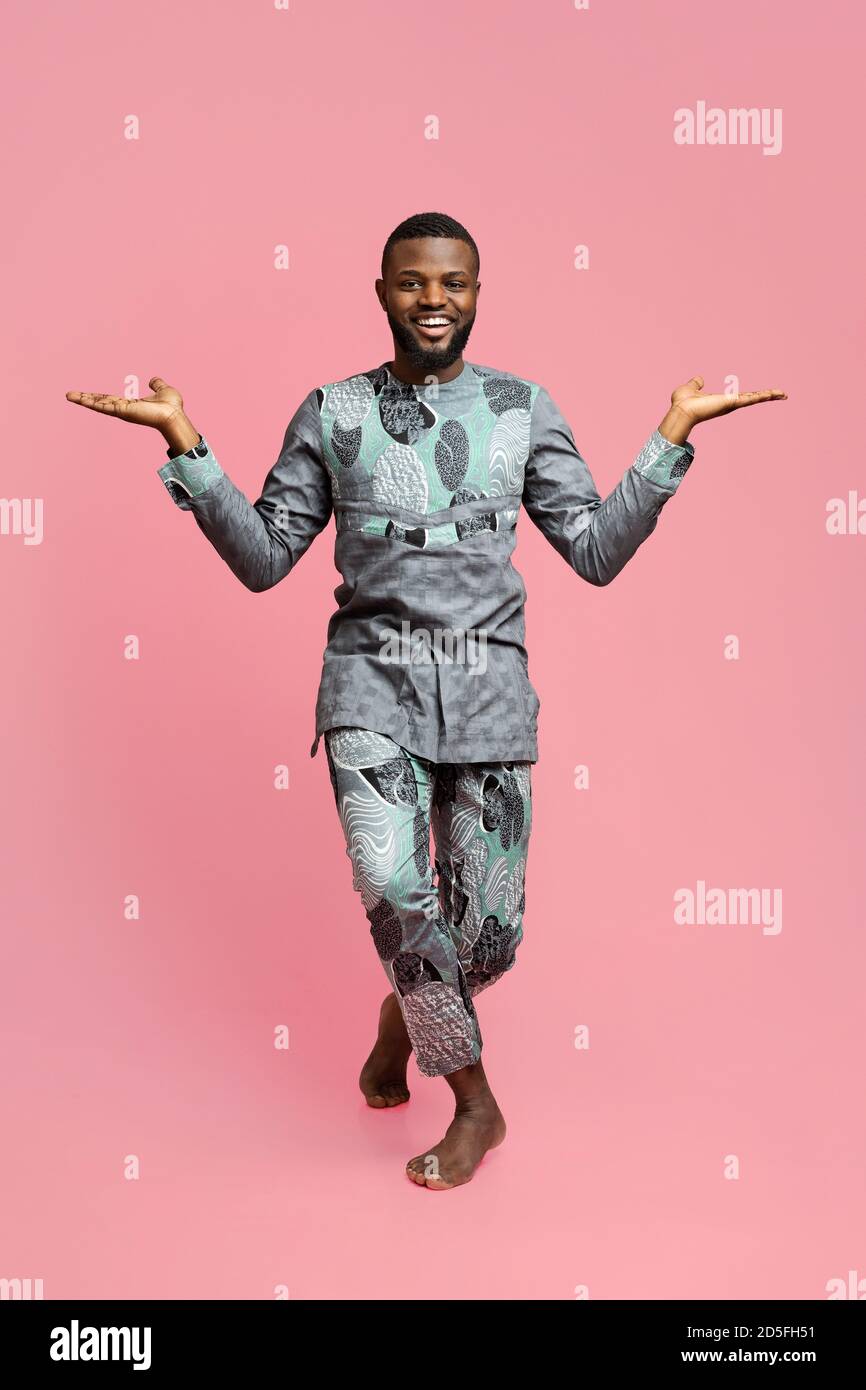 Cheerful african american man in traditional costume dancing Stock ...