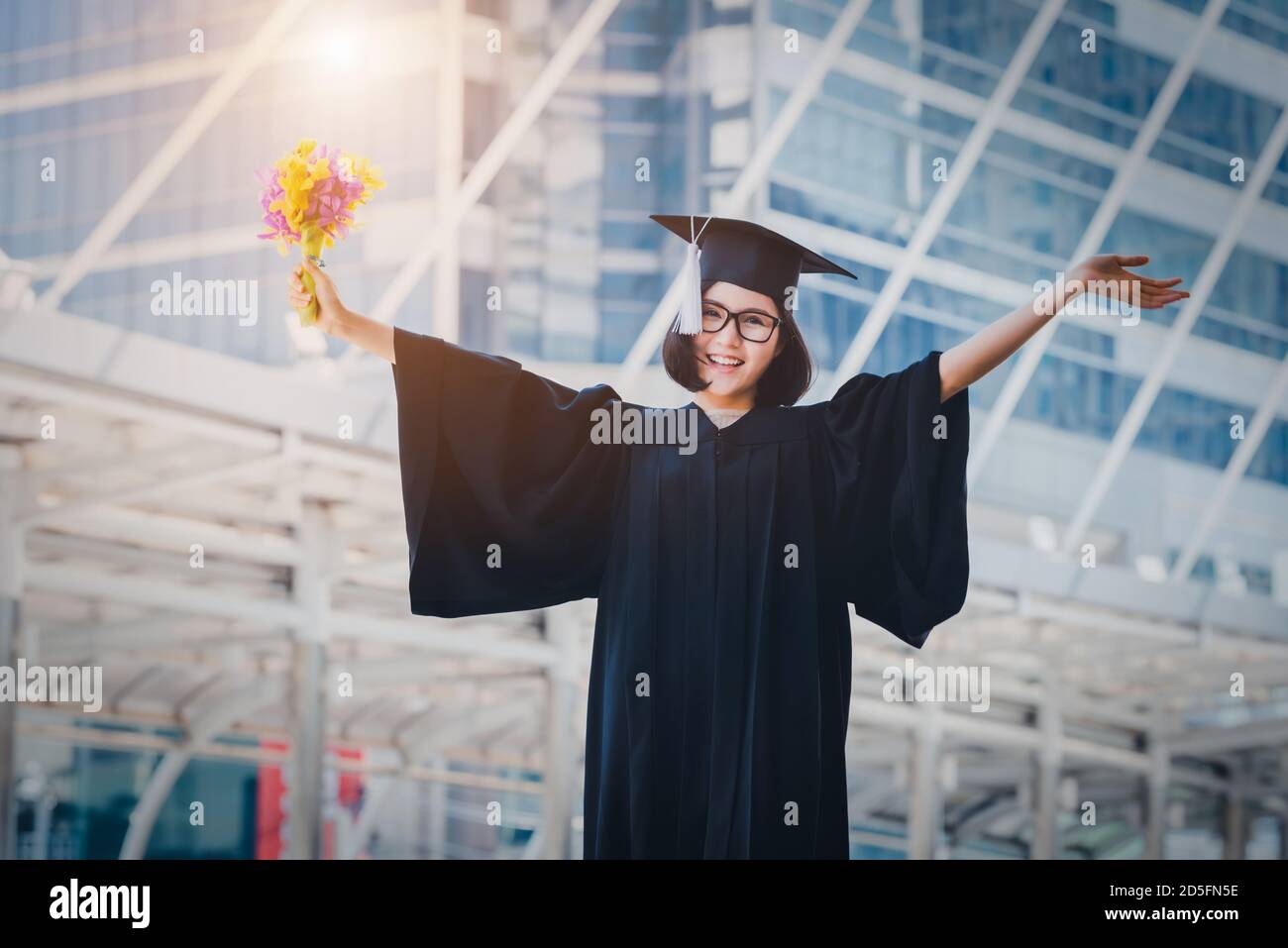Happy asian woman graduate degree in asian college Stock Photo - Alamy