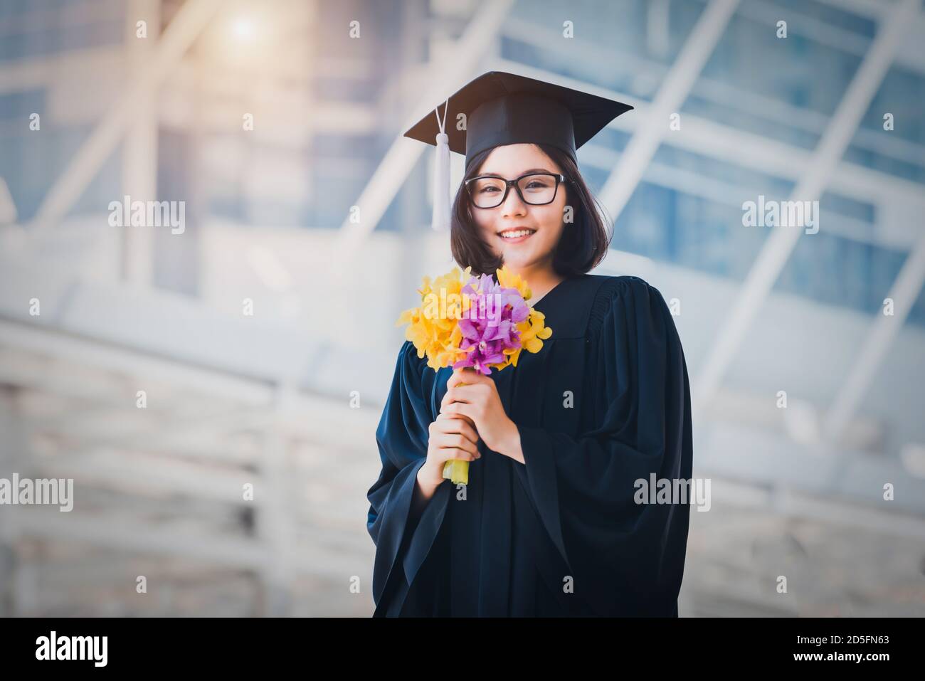 Happy asian woman graduate degree in asian college Stock Photo - Alamy