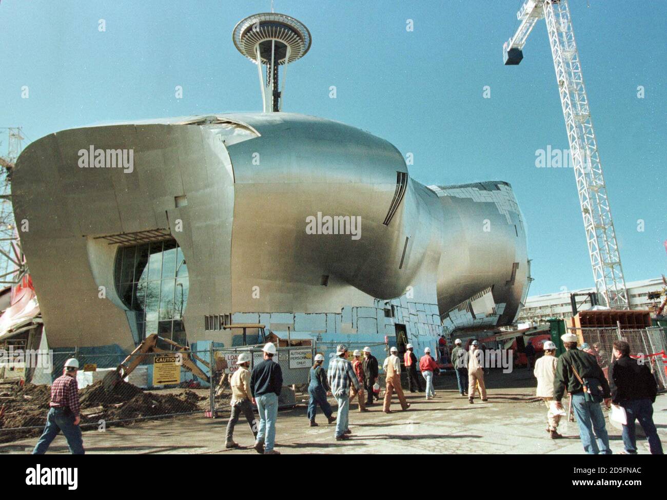 Construction workers continue work on the Experience Music Project (EMP ...