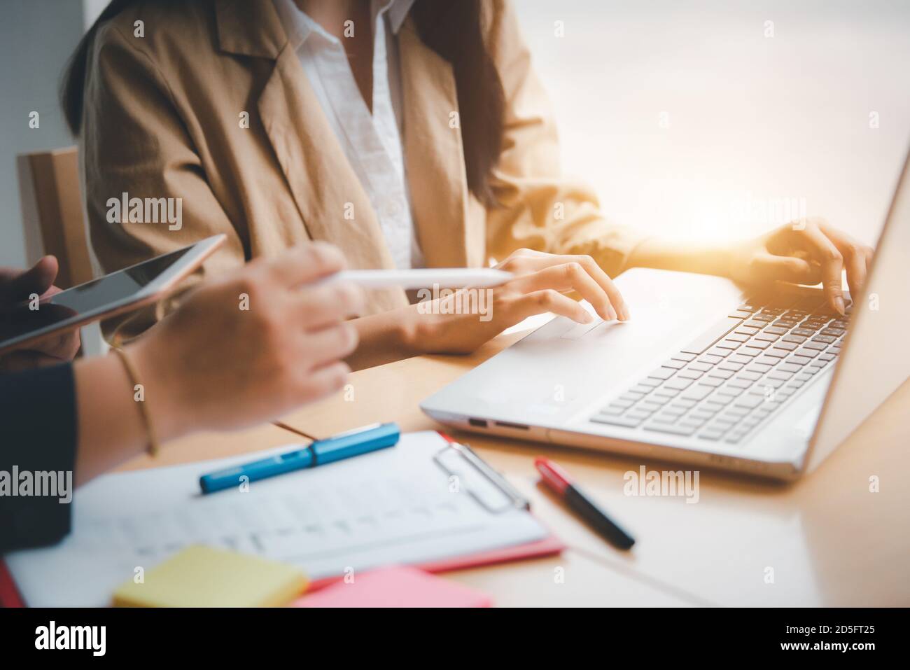 Close up Hand of businesswoman use laptop computer in cafe. Concept ...