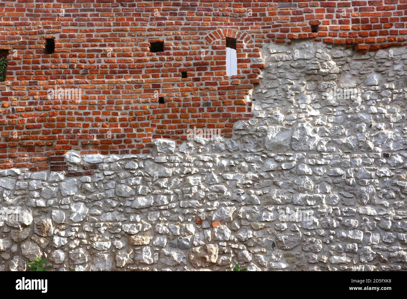 Cracow. Krakow. Poland. Medieval brick and limestone wall Stock Photo ...