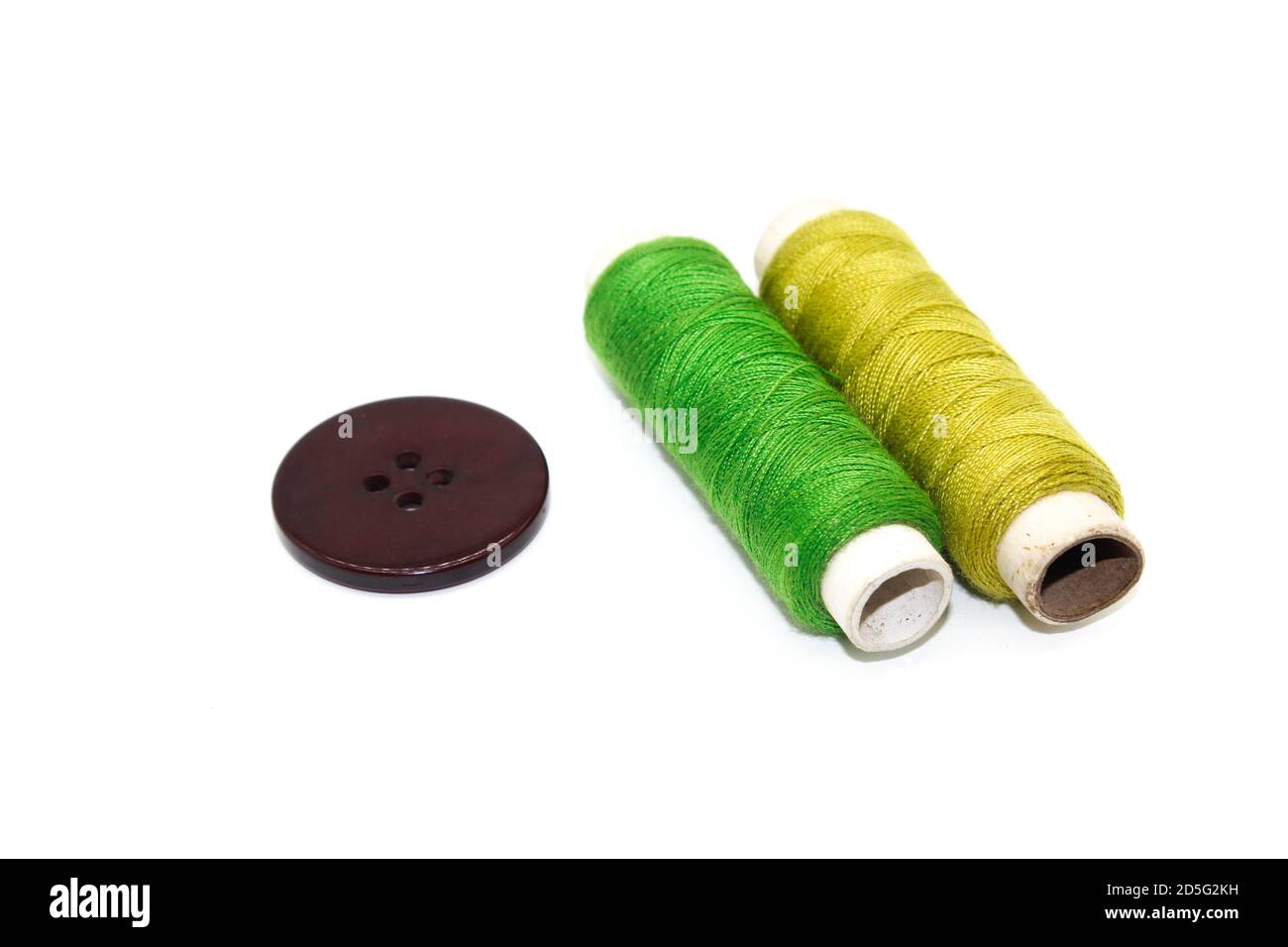 A picture of thread roll with white background Stock Photo - Alamy