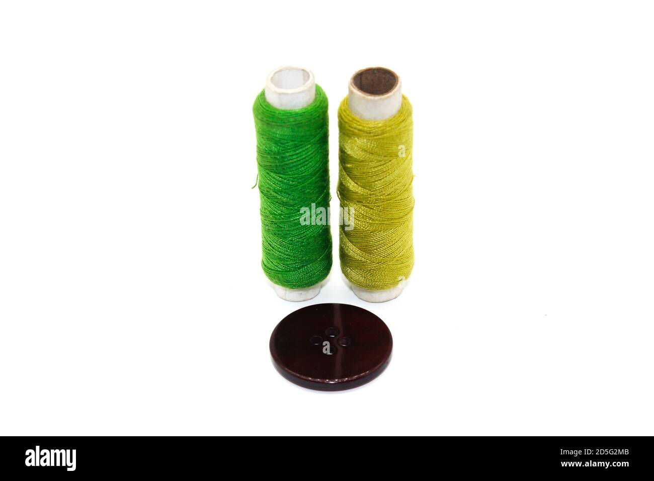 A picture of thread roll with white background Stock Photo - Alamy