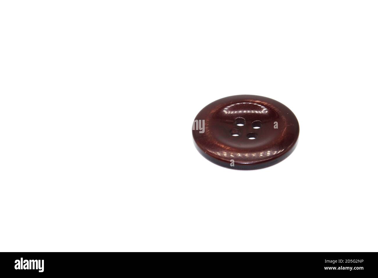 A picture of cloth button on white background Stock Photo - Alamy