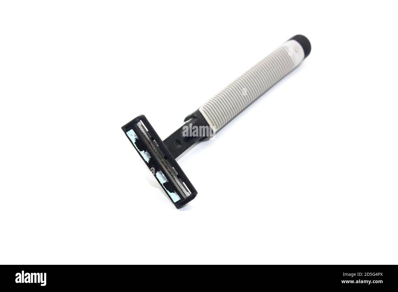 A picture of used hair razor on white background Stock Photo - Alamy