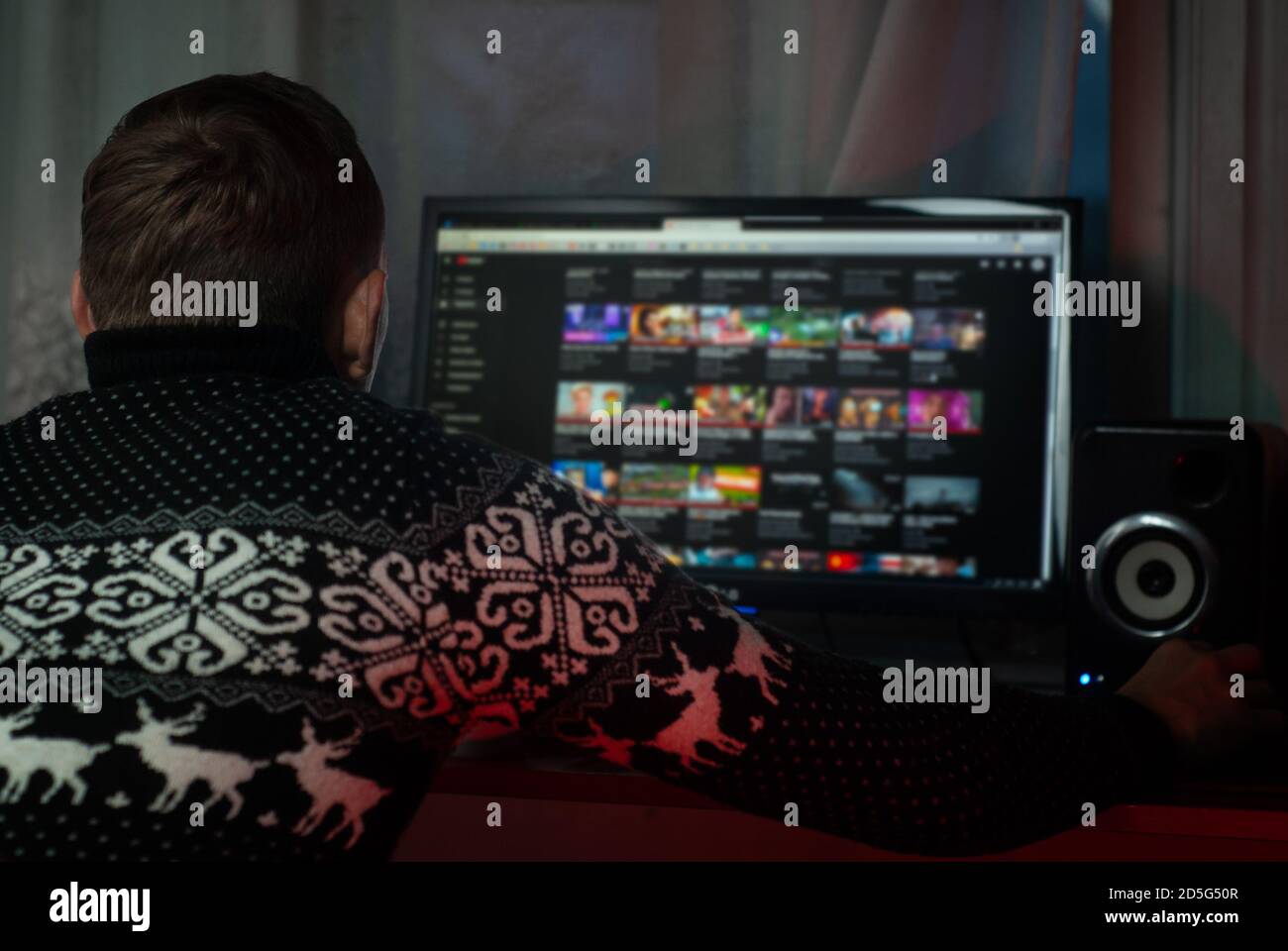 Man watches video on computer hi-res stock photography and images - Alamy