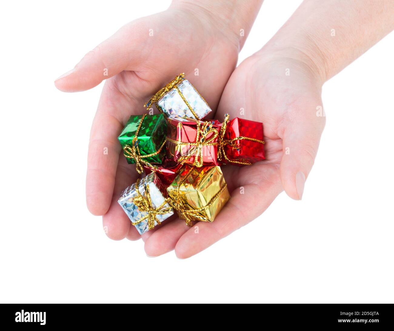 Woman holds many beautiful little Christmas gifts on white background ...