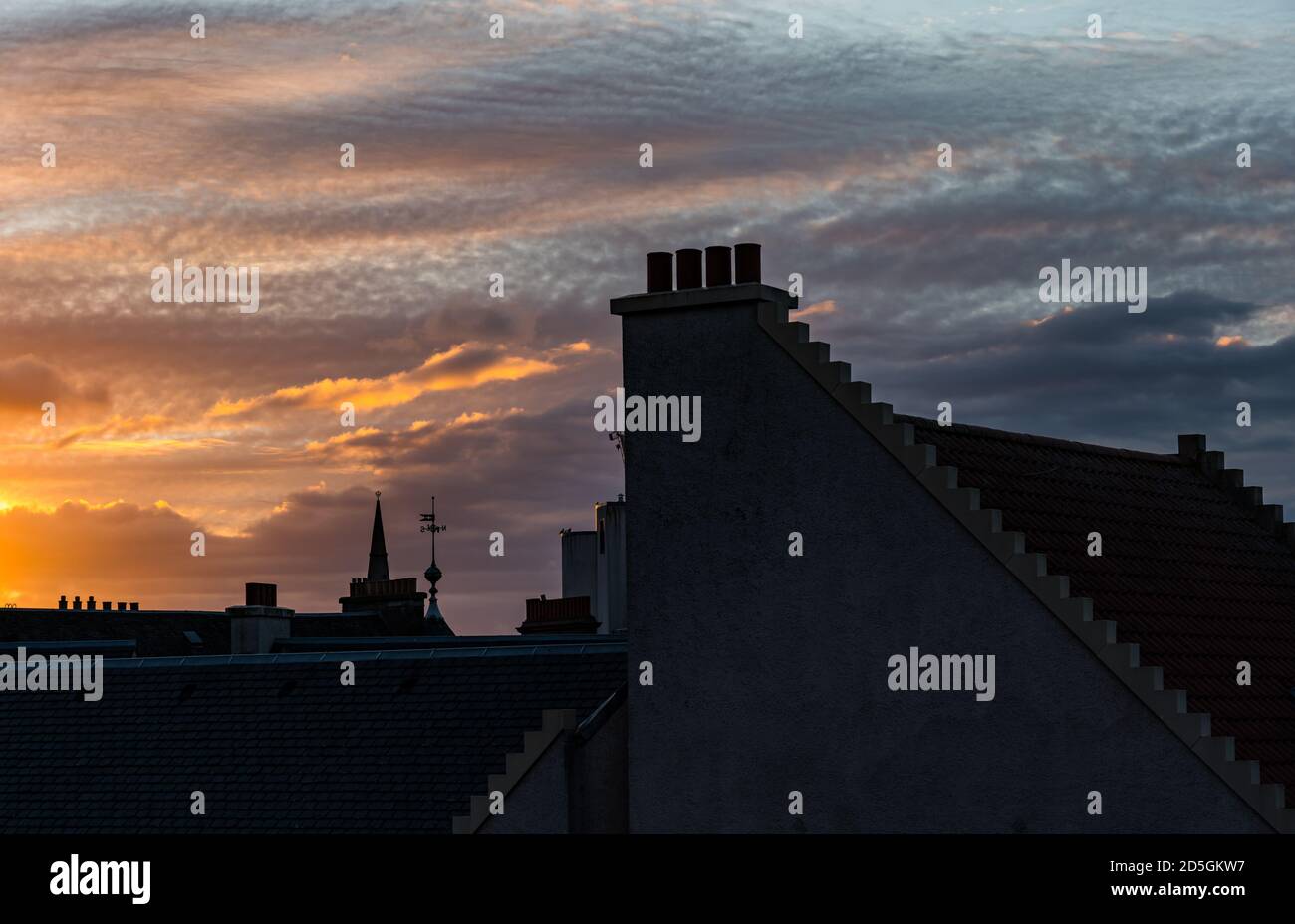 Roof top chimney sunset silhouette hi-res stock photography and images ...