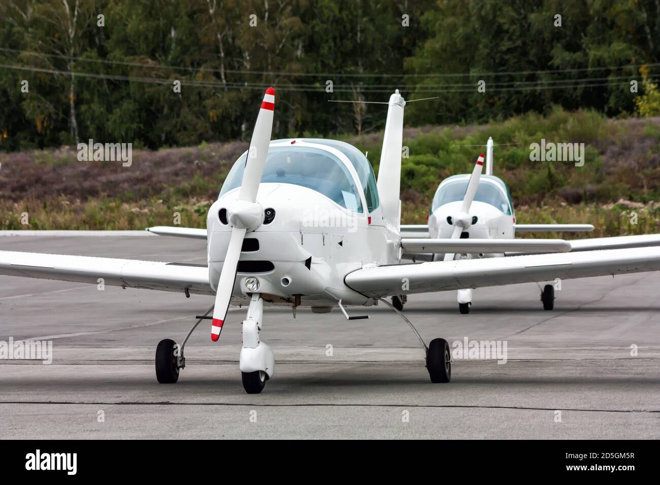 Small sports aircraft in the parking lot of the airfield Stock Photo ...