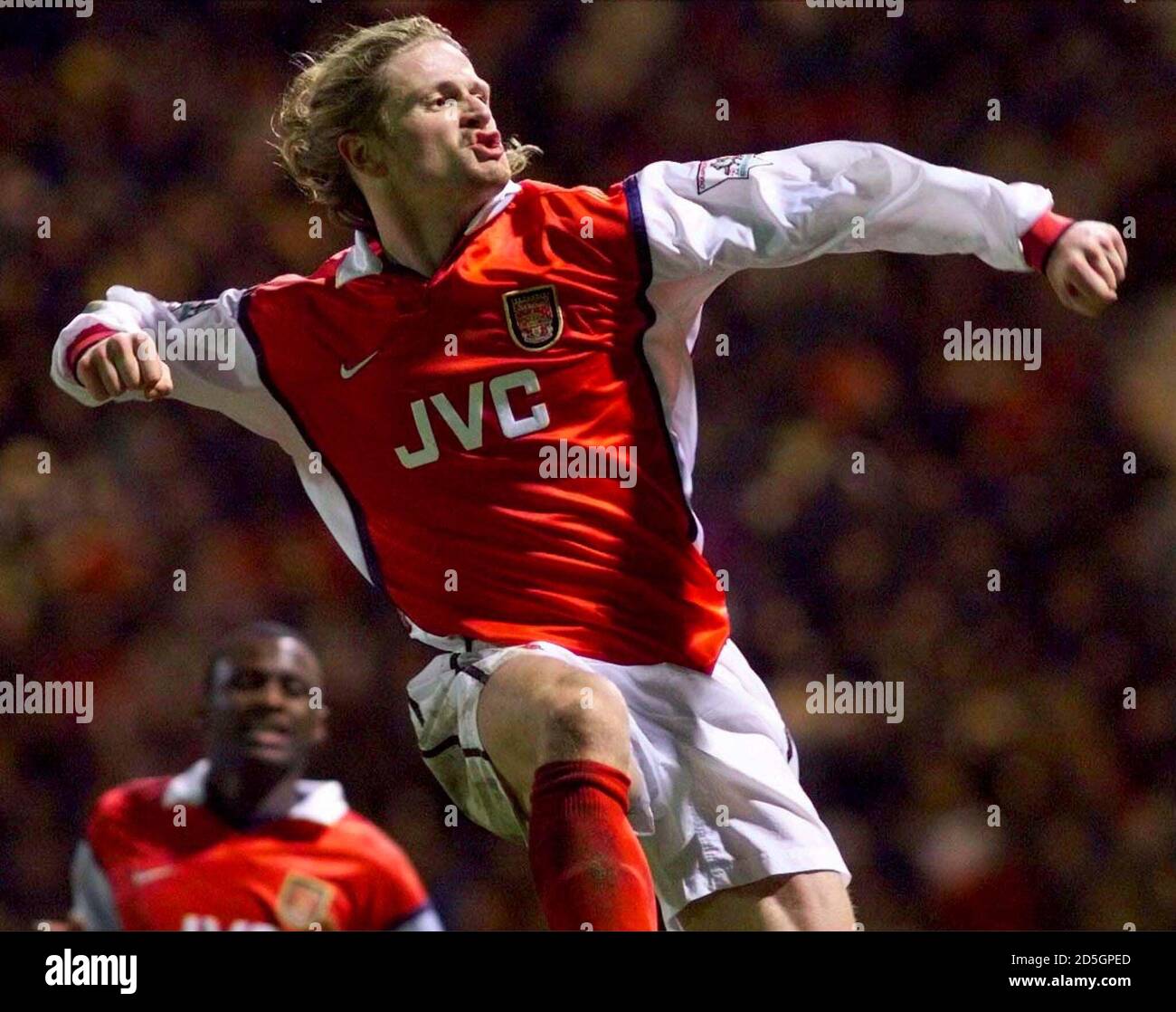 Arsenals emmanuel petit celebrates scoring the equalising goal hi-res ...