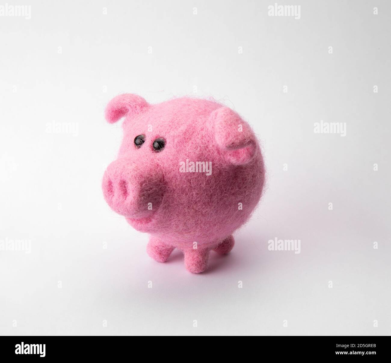 Handmade felt toy isolate on a white background. Pink piglet made of ...