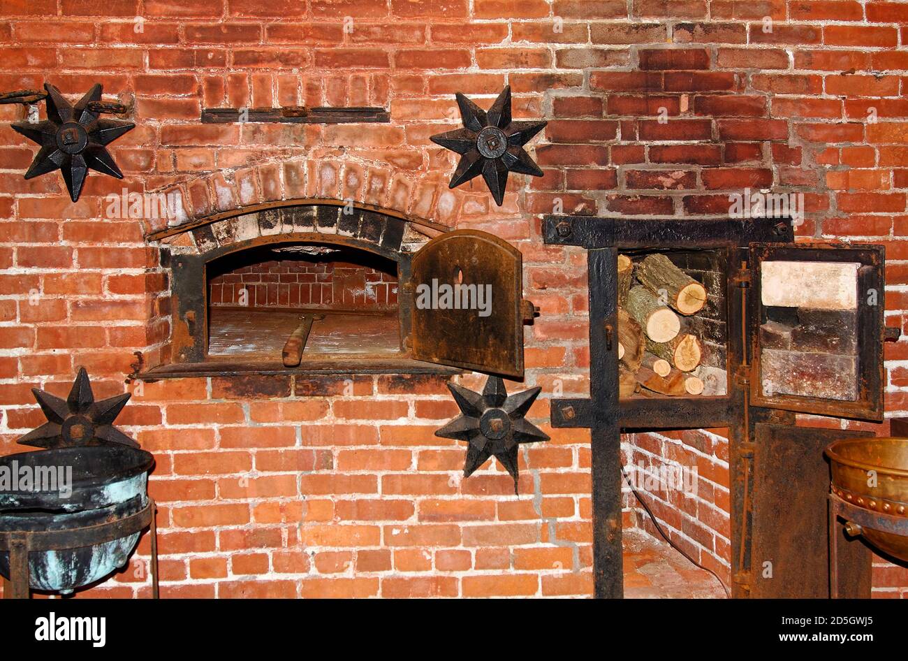 old pretzel oven, wood burning, red brick wall, antique; black ...