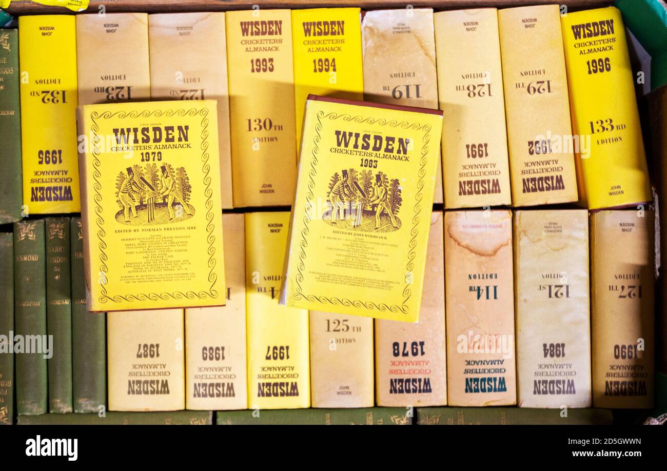 A box of Wisden Cricket almanack books on display in house clearance ...