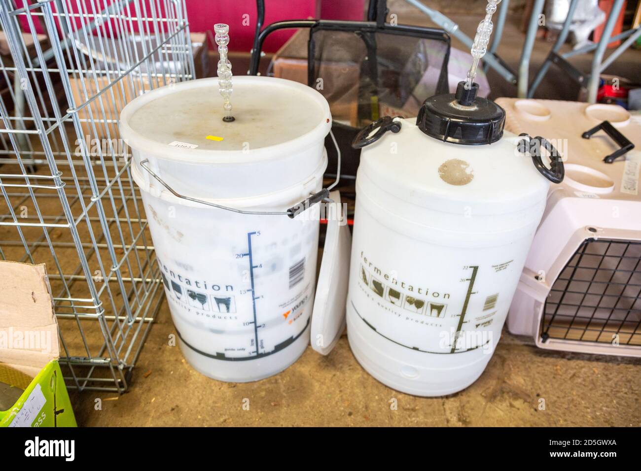 Plastic wine-making home brewing fermentation bins on display in house ...