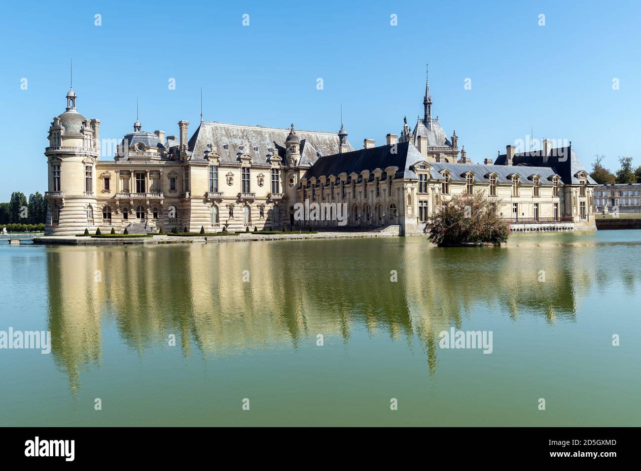 Chateau de Chantilly with reflection in the lake - France Stock Photo ...