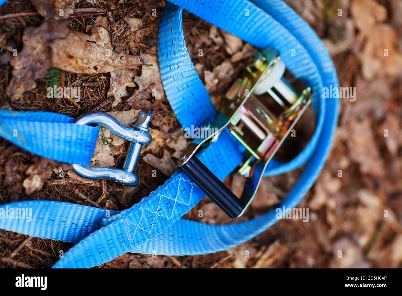 Man walking, jumping and balancing on rope in park Sports a tightrope ...