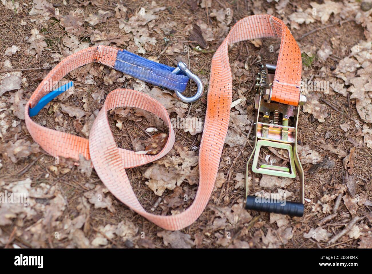 Man walking, jumping and balancing on rope in park Sports a tightrope ...