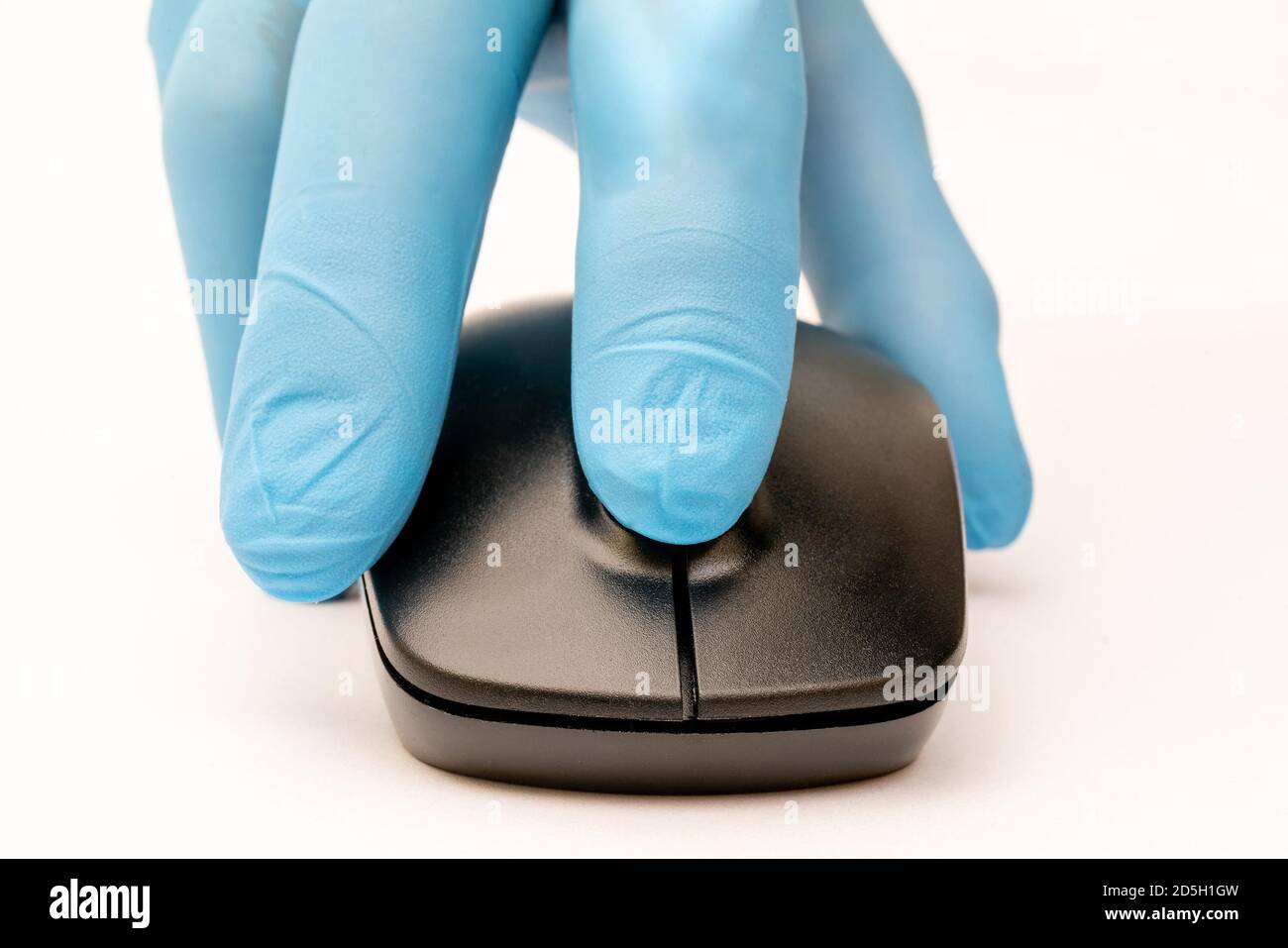 Black computer mouse in a man's hand in a blue medical glove Stock ...