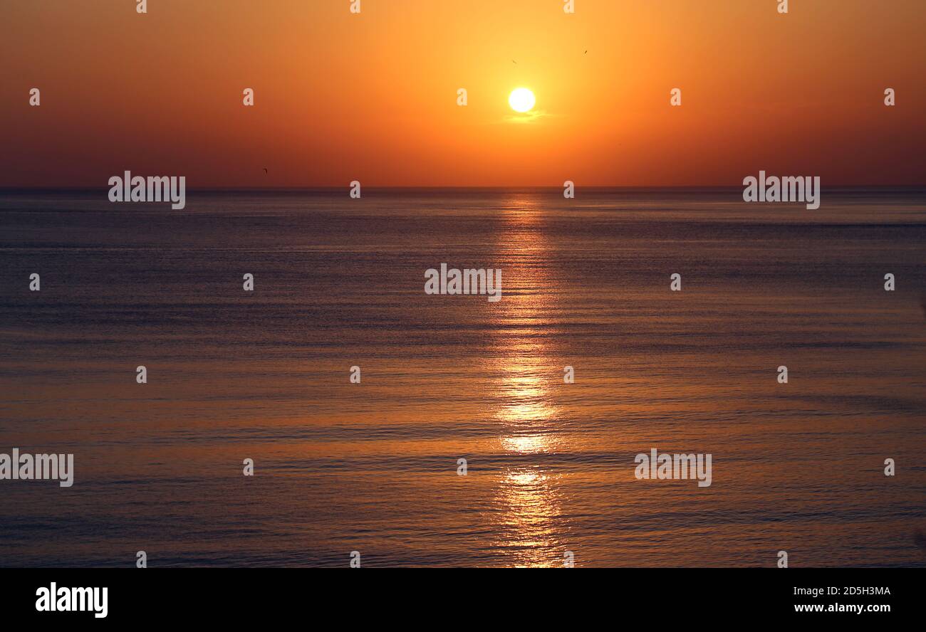 Beautiful photo of the sea landscape at sunset Stock Photo - Alamy