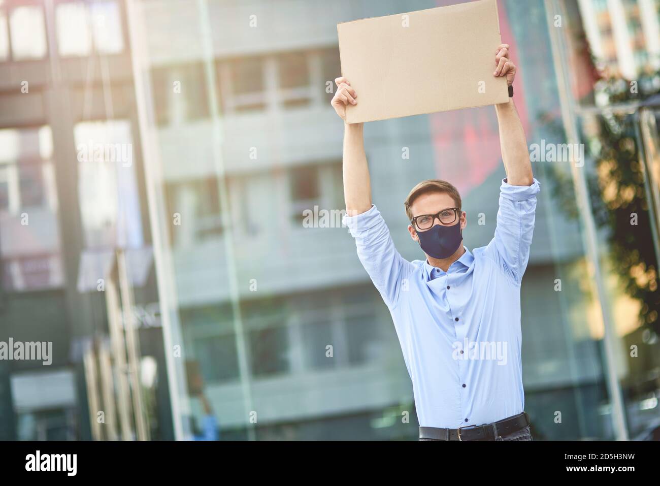 Black man holding placard protest hi-res stock photography and images ...