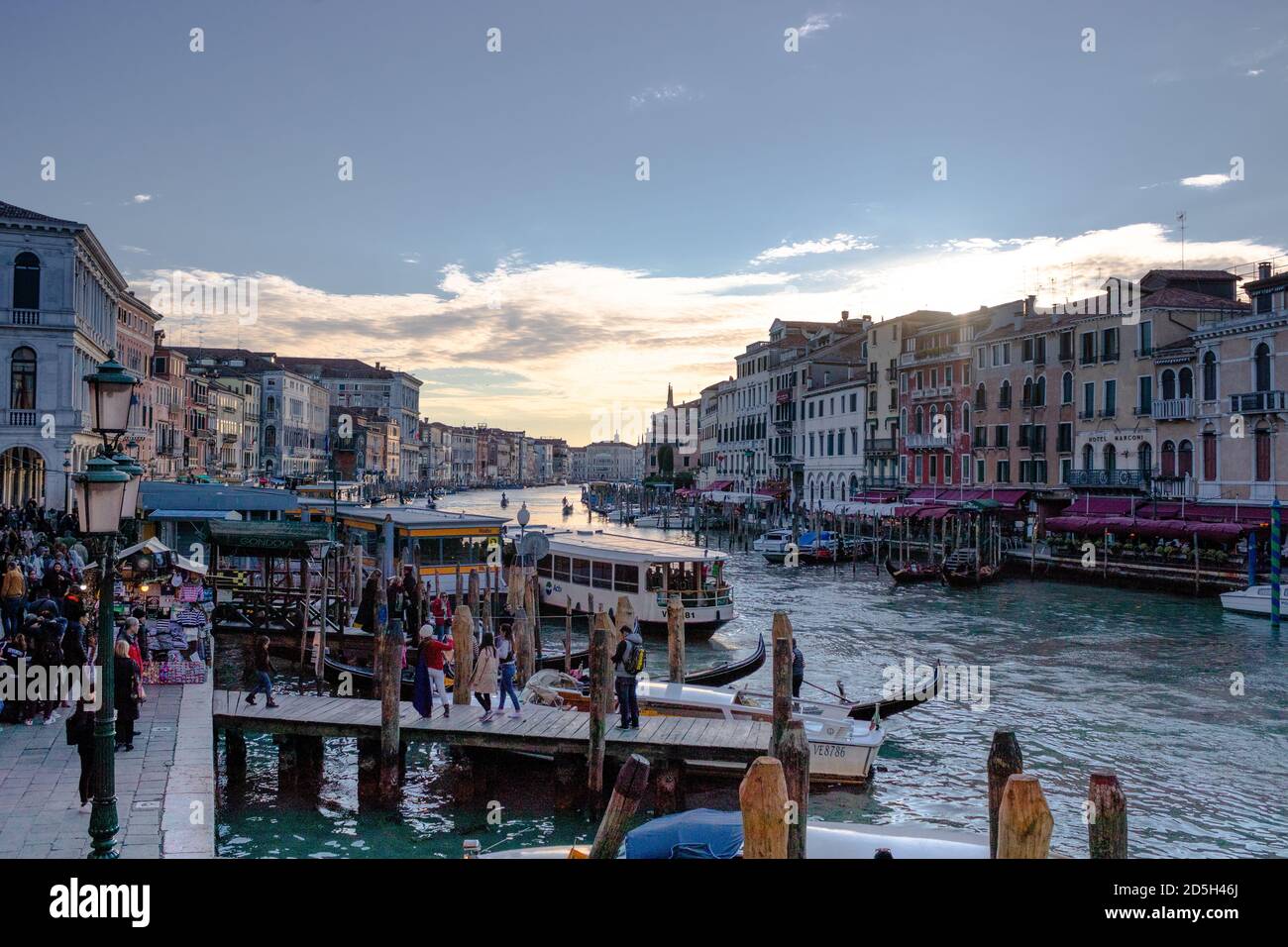 Scenic view from the side of the Grand Canal as the sun sets over ...