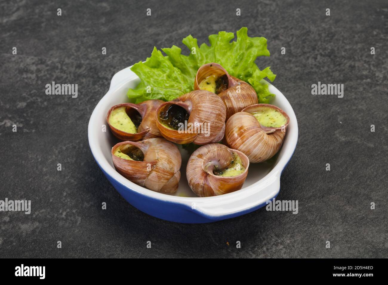 French cuisine - Escargot with butter sauce Stock Photo - Alamy