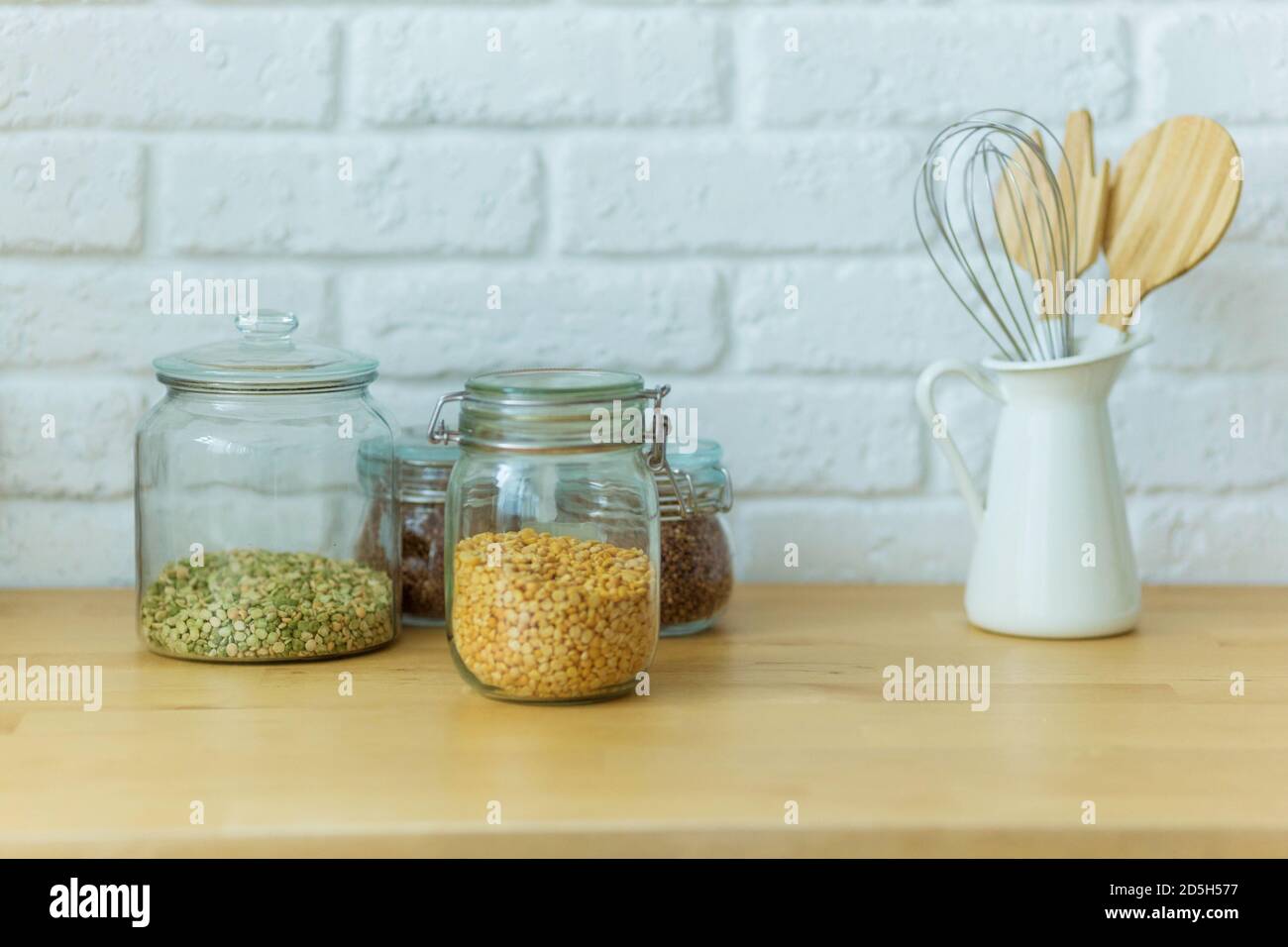 .Storage of cereals, peas, spices in the kitchen. Bulk containers Stock ...